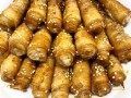 香煎五花肉卷金针菇怎么做_香煎五花肉卷金针菇好吃吗