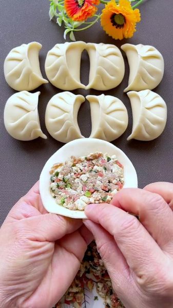 饺子花边怎么捏_饺子花边捏法图解-第2张图片-山城妙识 饺子花边怎么捏_饺子花边捏法图解-第2张图片-山城妙识