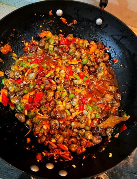 炒田螺图片大全大图_炒田螺怎么炒才入味-第1张图片-山城妙识