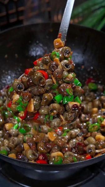 炒田螺图片大全大图_炒田螺怎么炒才入味-第3张图片-山城妙识