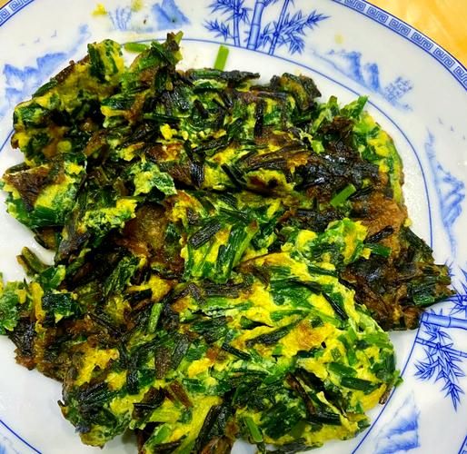 韭菜煎鸡蛋怎么做_韭菜煎鸡蛋要不要焯水-第1张图片-山城妙识