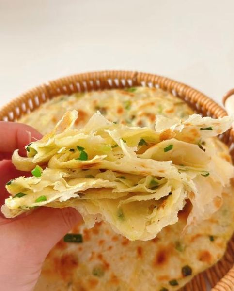 烫面葱油饼怎么做_烫面葱油饼为什么柔软多层-第1张图片-山城妙识 烫面葱油饼怎么做_烫面葱油饼为什么柔软多层-第1张图片-山城妙识