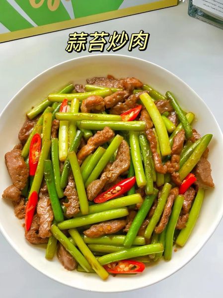 猪肉炒蒜苔怎么做好吃_蒜苔炒肉先炒哪个-第1张图片-山城妙识 猪肉炒蒜苔怎么做好吃_蒜苔炒肉先炒哪个-第1张图片-山城妙识
