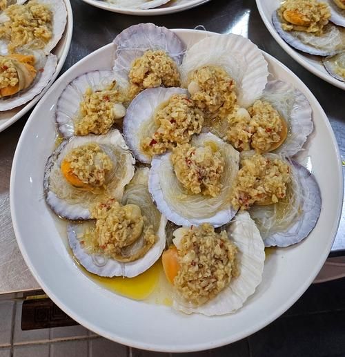 蒜蓉扇贝怎么蒸才鲜嫩_蒜蓉扇贝做法窍门-第3张图片-山城妙识