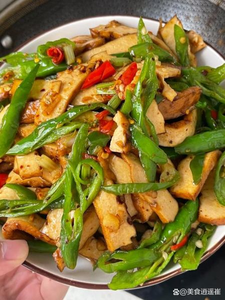 青椒炒豆腐干怎么做_青椒炒豆腐干热量高吗-第3张图片-山城妙识