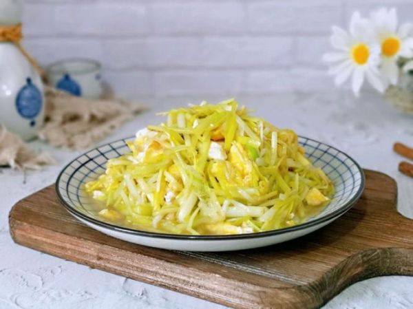 韭黄炒鸡蛋怎么做才嫩_韭黄炒鸡蛋的窍门有哪些-第1张图片-山城妙识