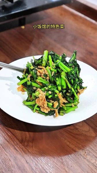 茼蒿炒鸡蛋怎么做好吃_茼蒿炒鸡蛋的家常做法-第1张图片-山城妙识