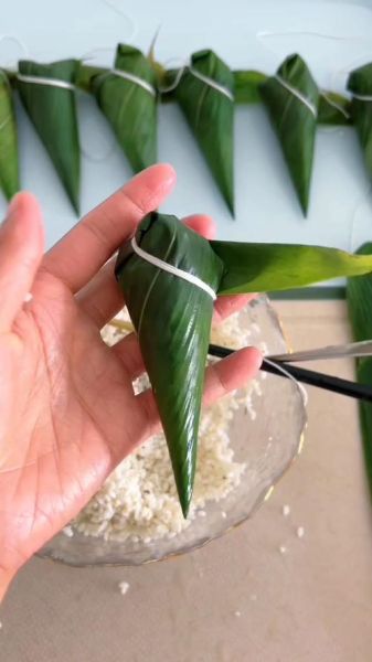 三角粽子怎么绑_三角粽子绑法视频教程-第2张图片-山城妙识