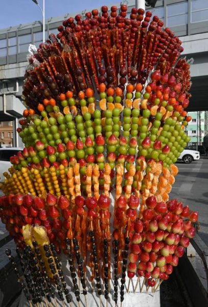 冰糖葫芦的寓意和象征_为什么过年吃它-第1张图片-山城妙识 冰糖葫芦的寓意和象征_为什么过年吃它-第1张图片-山城妙识