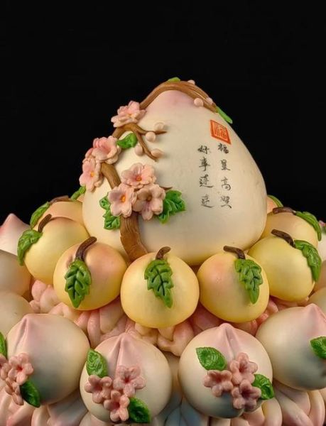 寿桃的寓意和象征是什么_寿桃在祝寿中的传统用法-第1张图片-山城妙识 寿桃的寓意和象征是什么_寿桃在祝寿中的传统用法-第1张图片-山城妙识