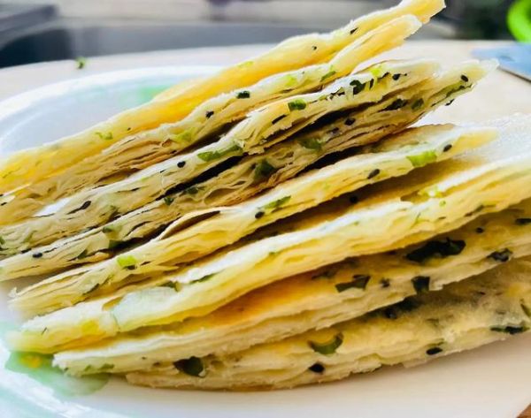 葱油饼怎么做才酥脆_街头葱油饼配方揭秘-第2张图片-山城妙识 葱油饼怎么做才酥脆_街头葱油饼配方揭秘-第2张图片-山城妙识