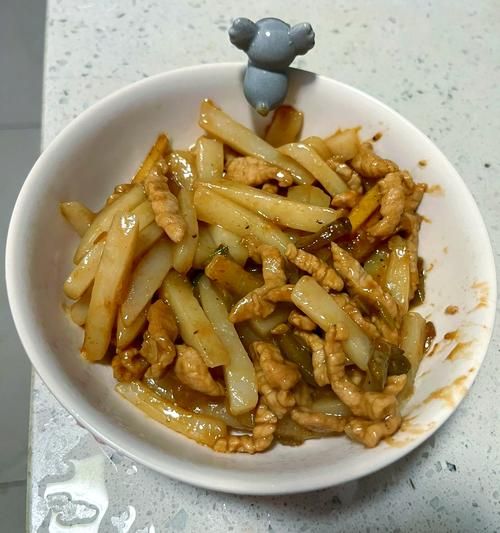 肉丝炒年糕怎么做好吃_家常做法步骤-第1张图片-山城妙识