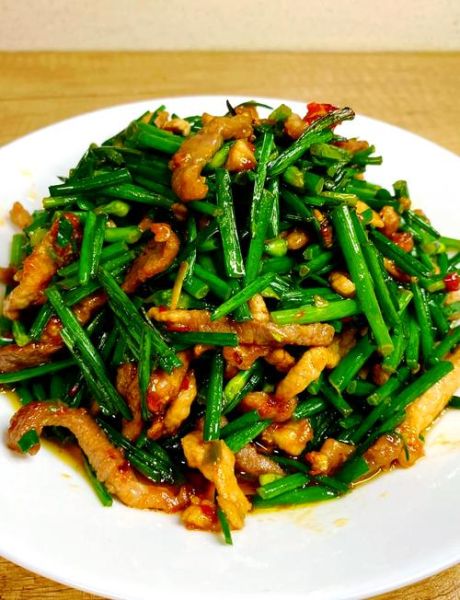 韭菜花炒肉怎么炒好吃_韭菜花炒肉的家常做法-第1张图片-山城妙识