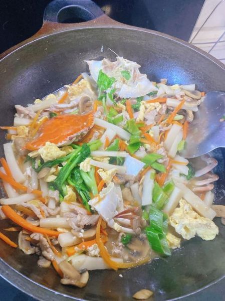 蟹炒年糕怎么做_蟹炒年糕的家常做法-第1张图片-山城妙识