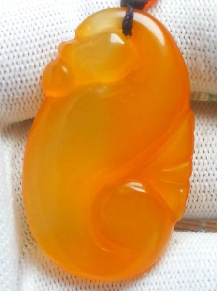 荔枝冻玛瑙的功效与作用_佩戴禁忌有哪些-第1张图片-山城妙识